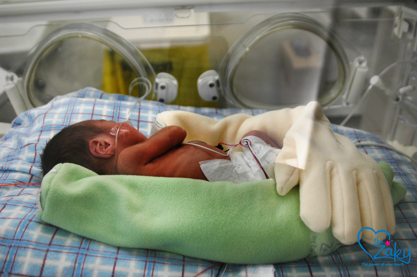 Why does the Zaky HUG have the shape of the parents' arms/hands? – The ...